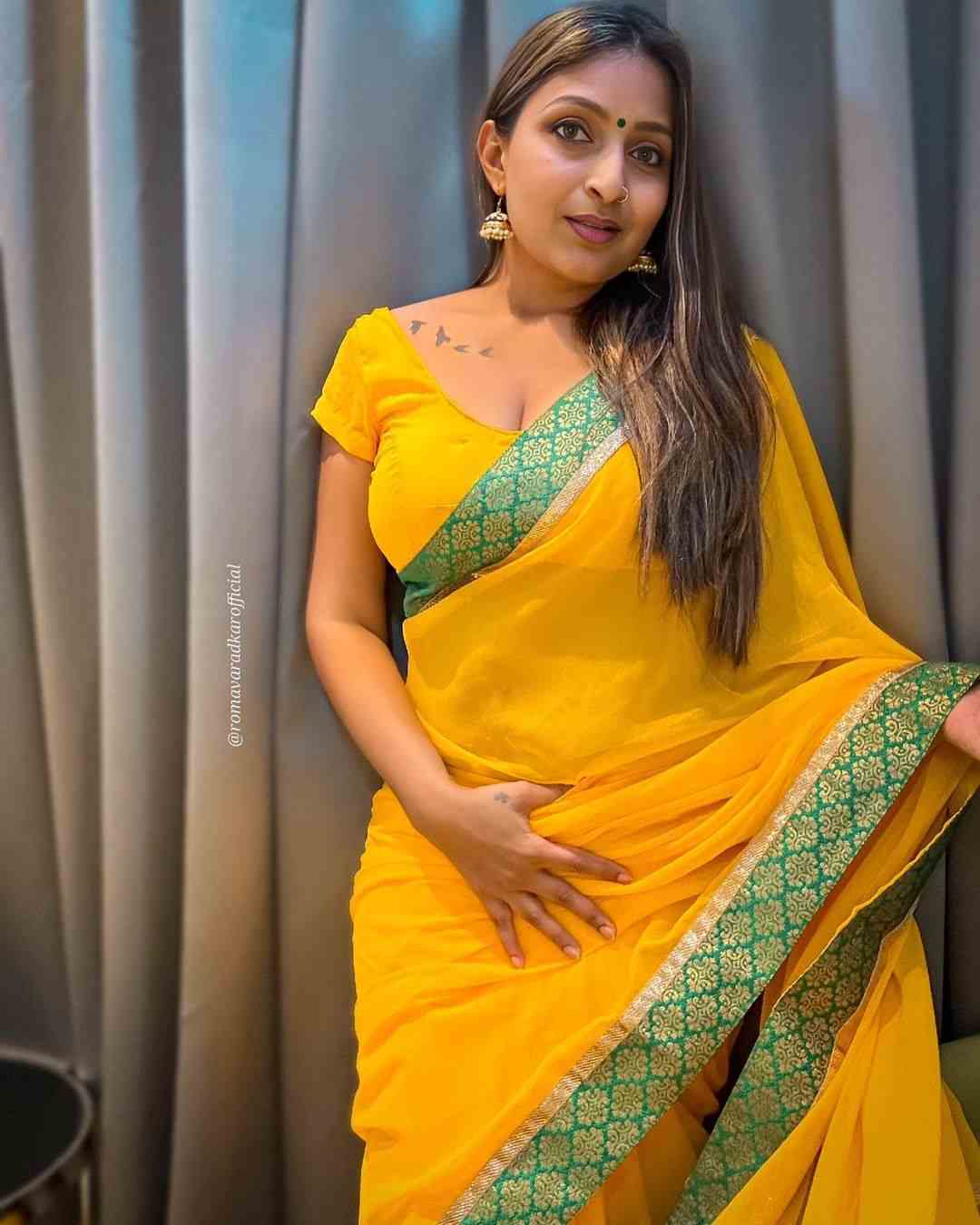 Roma varadkar silky slim navel exposed in yellow saree - glamsundari.in