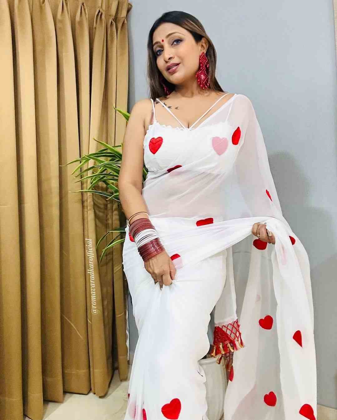 Roma varadkar spicy cleavage navel exposed in white sleeveless saree ...